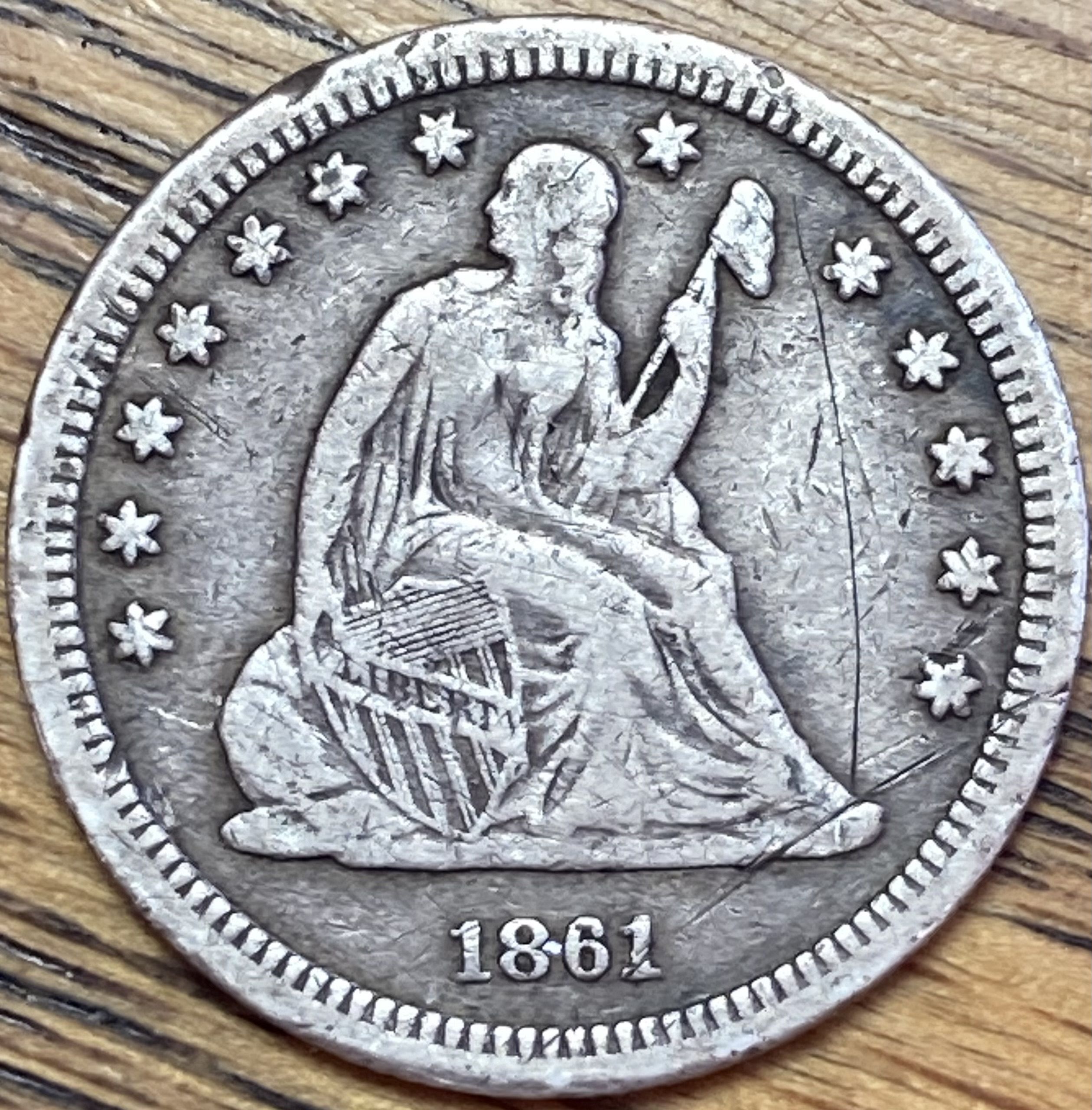 1861 seated liberty quarter in VERY FINE condition with eye appeal ...